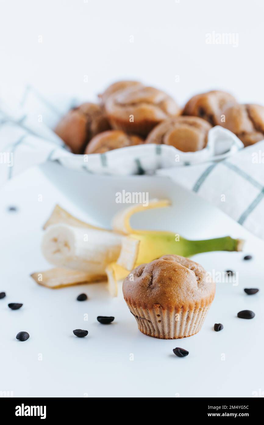A vertical shot of blueberry muffins on the white background Stock ...