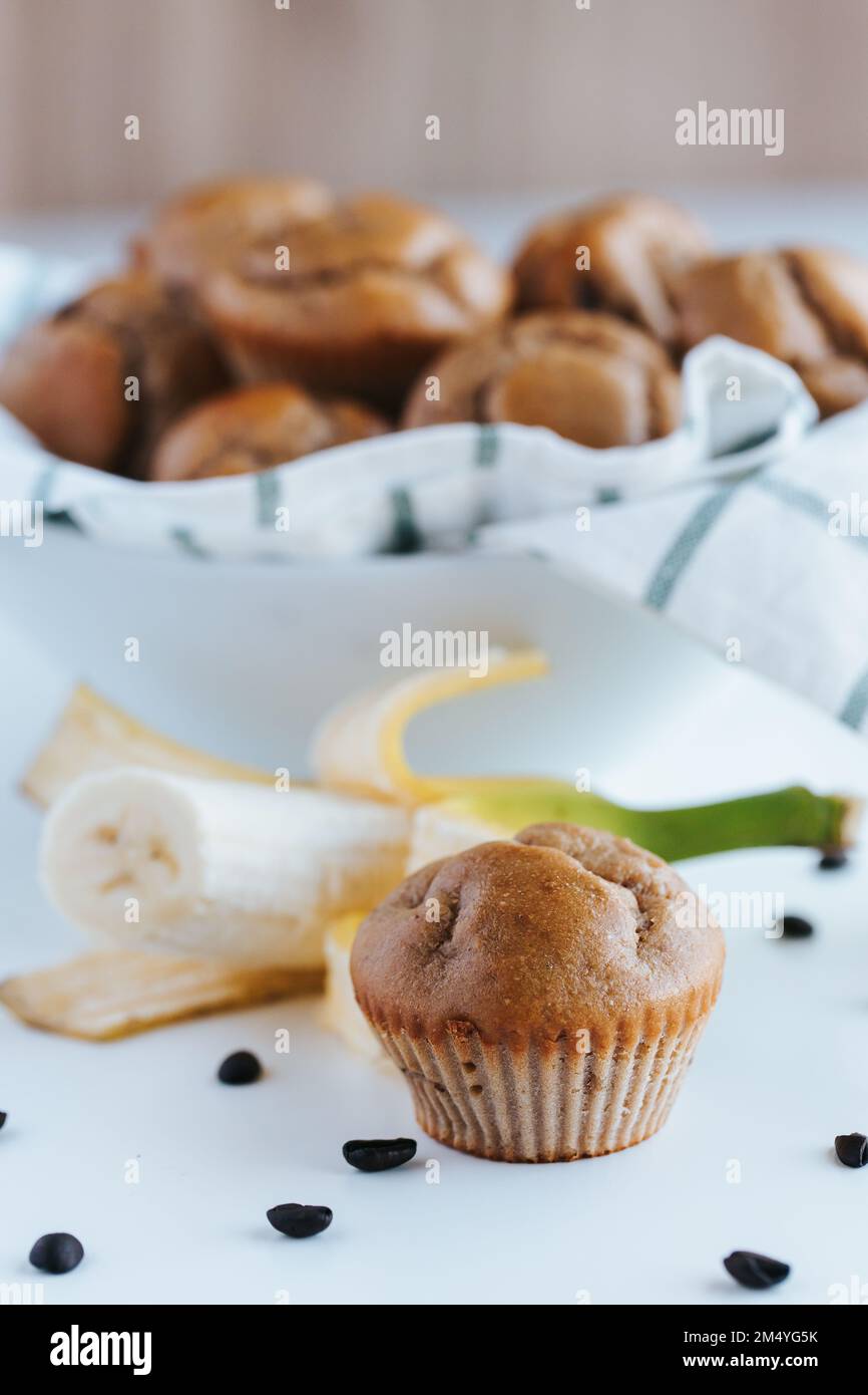 A vertical shot of blueberry muffins on the white background Stock ...