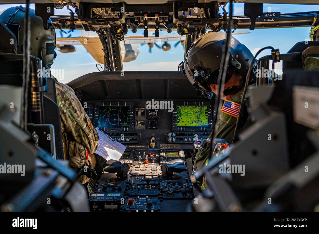 Crew on an HH-60W Jolly Green II from the 512th Rescue Squadron conduct ...