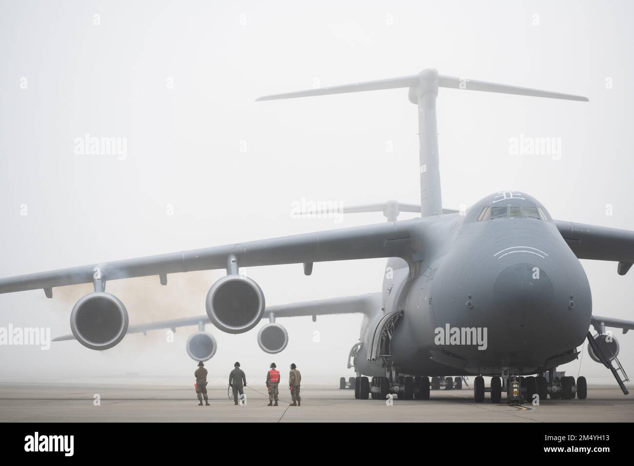U.S. Airmen assigned to the 60th Air Mobility Wing perform preflight ...