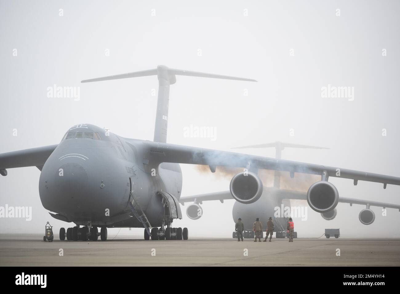 U.S. Airmen assigned to the 60th Air Mobility Wing perform preflight ...