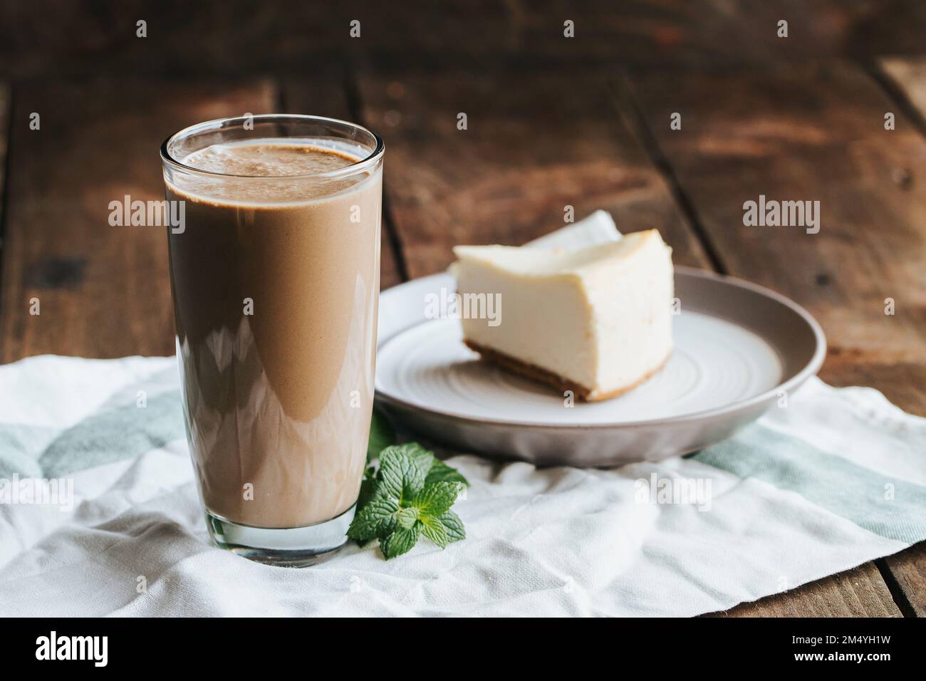 A closeup shot of a hot chocolate on the wooden background Stock Photo ...