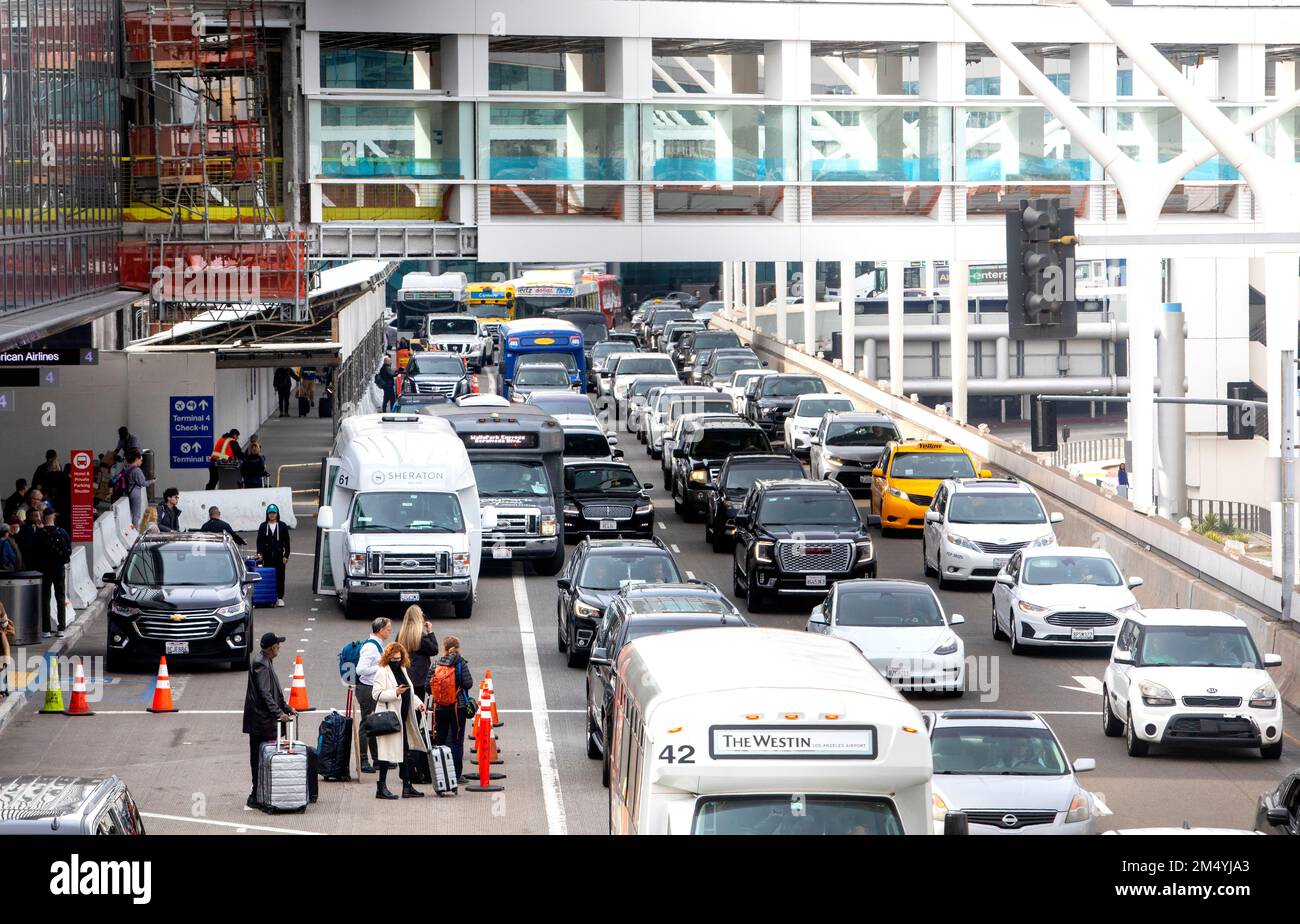 Los Angeles, California, USA. 22nd Dec, 2022. Travelers wait for ...