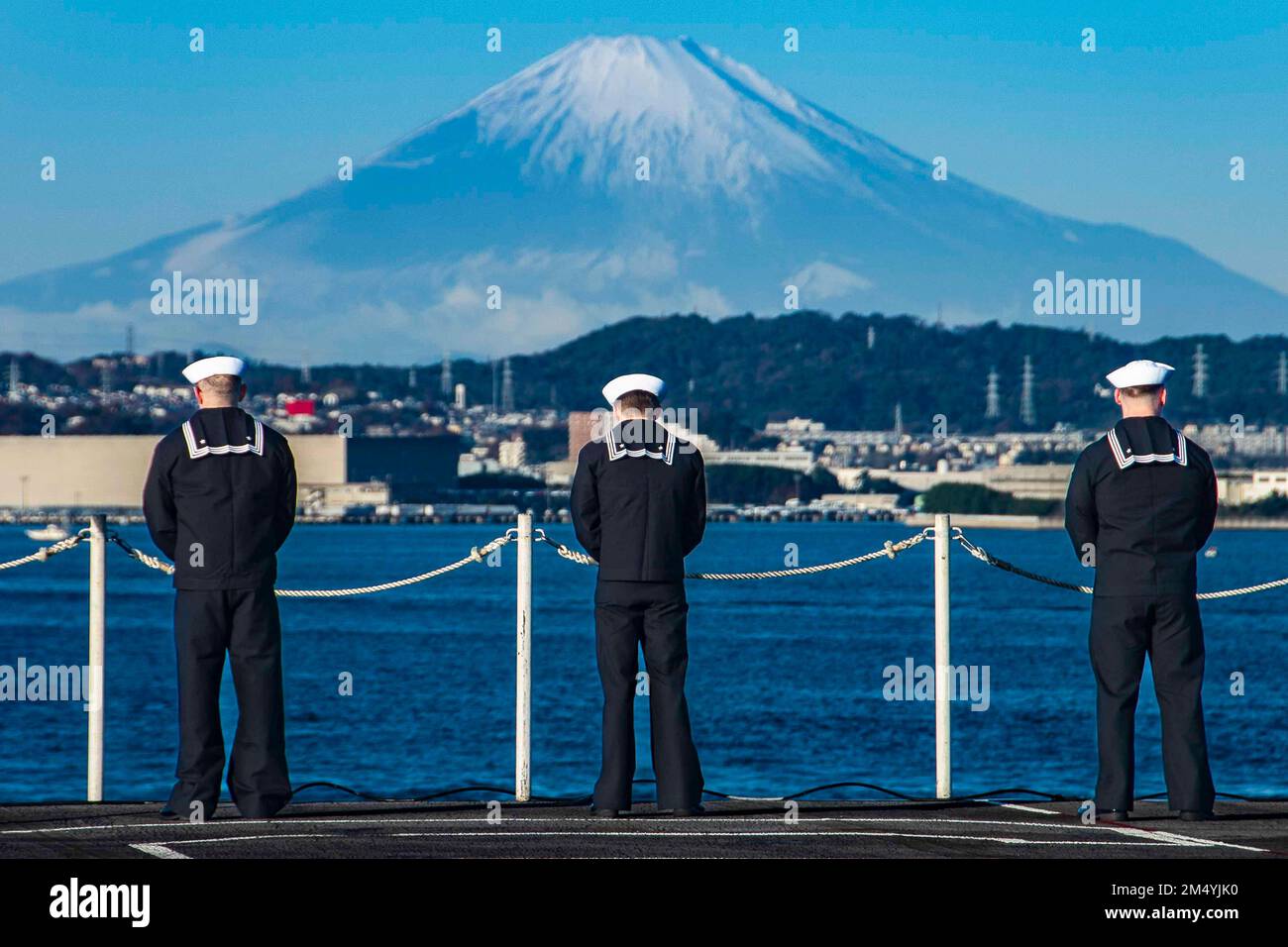 YOKOSUKA, Japan. 16th Dec, 2022. Sailors man the rails as the U.S. Navy ...