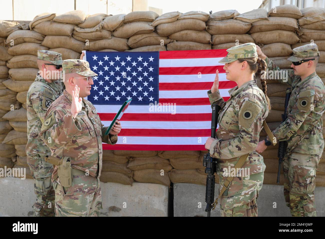 Erbil, Iraq. 11th Dec, 2022. U.S. Army Capt. Kevin T. Livingston, left ...