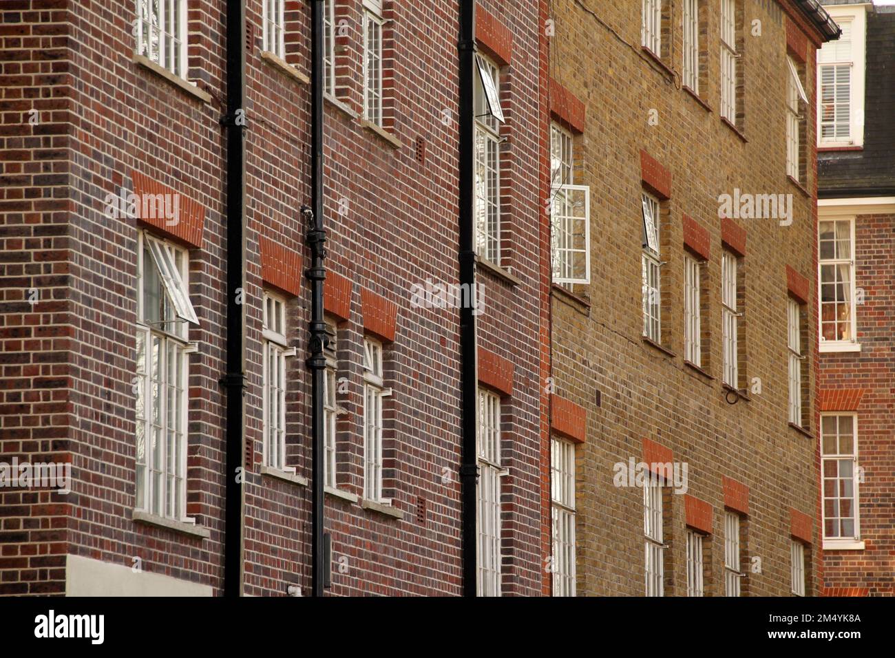 A residential building facade with windows in London Stock Photo - Alamy