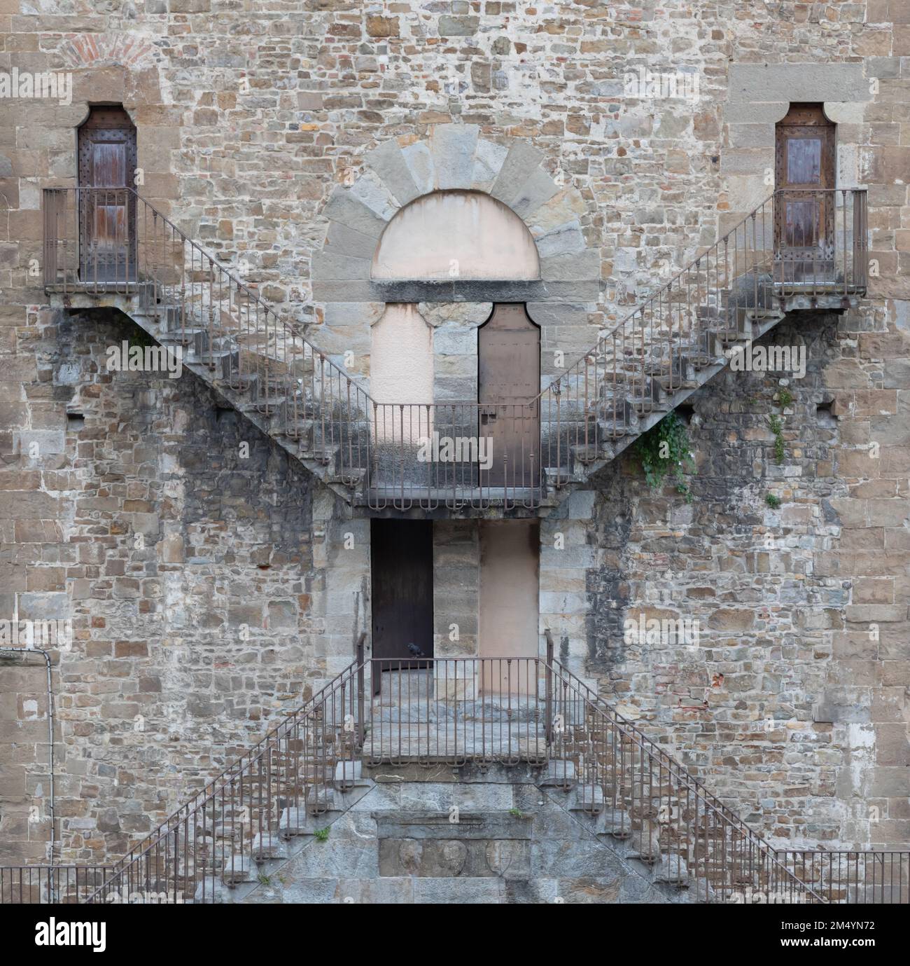 Exterior of antique building with Escher architecture style. Simmetry ...