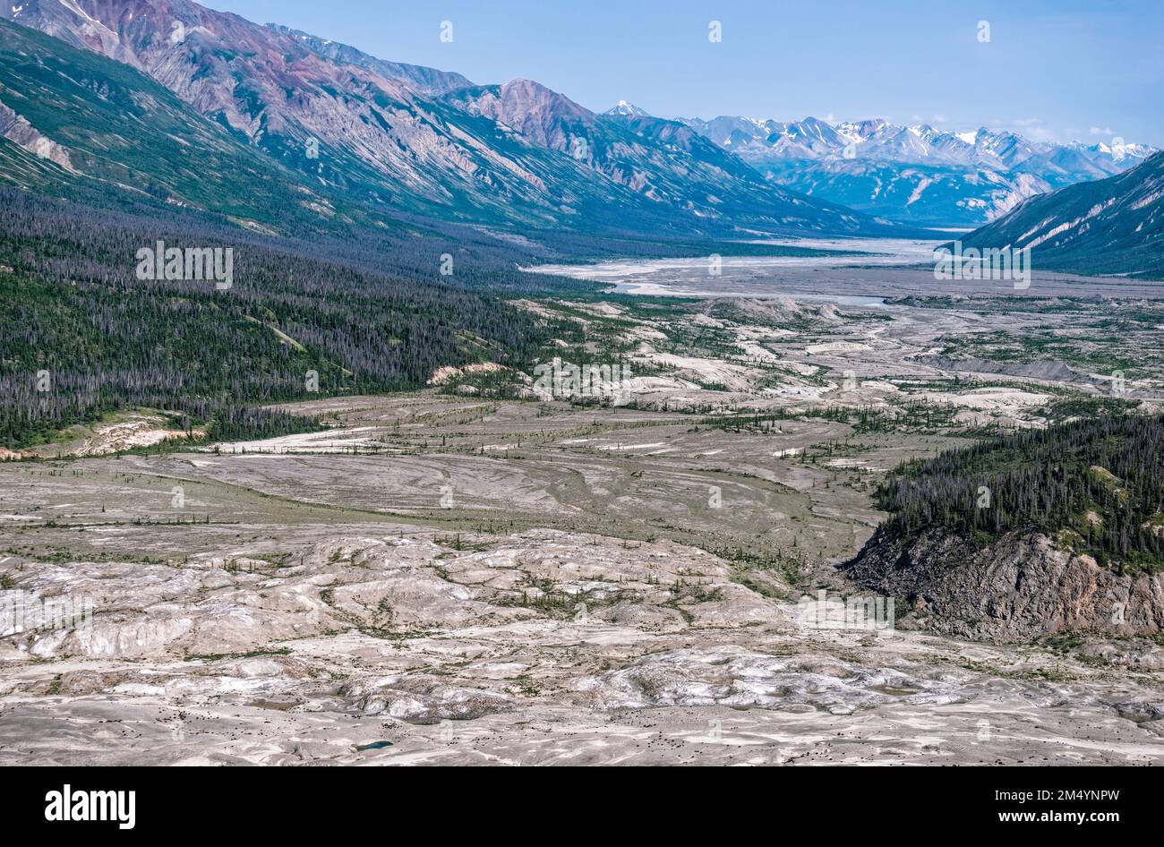 The Slims River flows through the distant valley at Kluane National ...