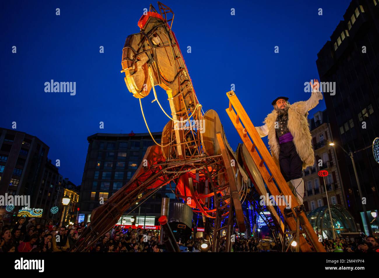 Bilbao, Spain. 23rd Dec, 2022. Olentzero greets the public as he gets ...