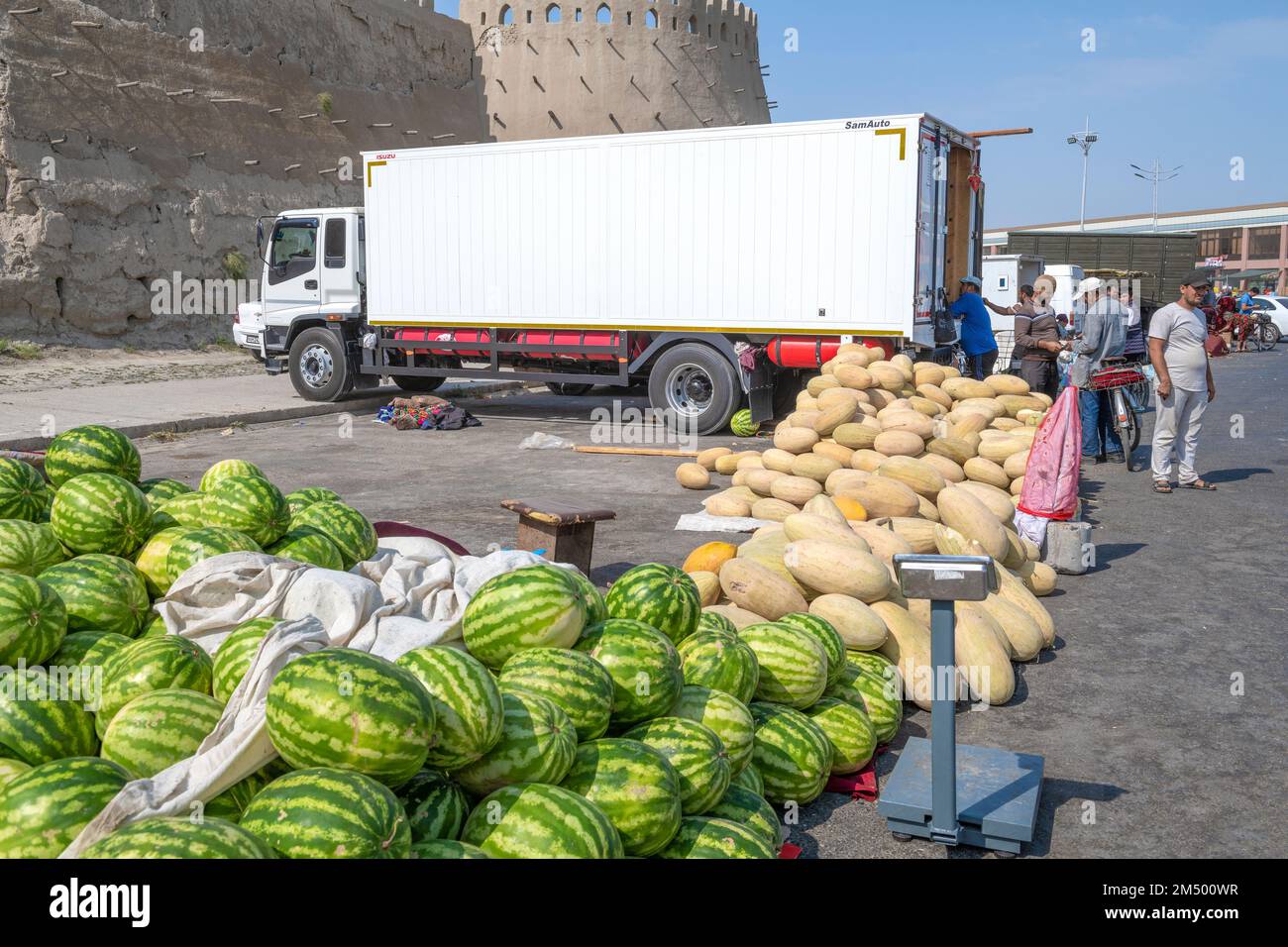 BUKHARA, UZBEKISTAN - SEPTEMBER 09, 2022: Trade of melons and ...