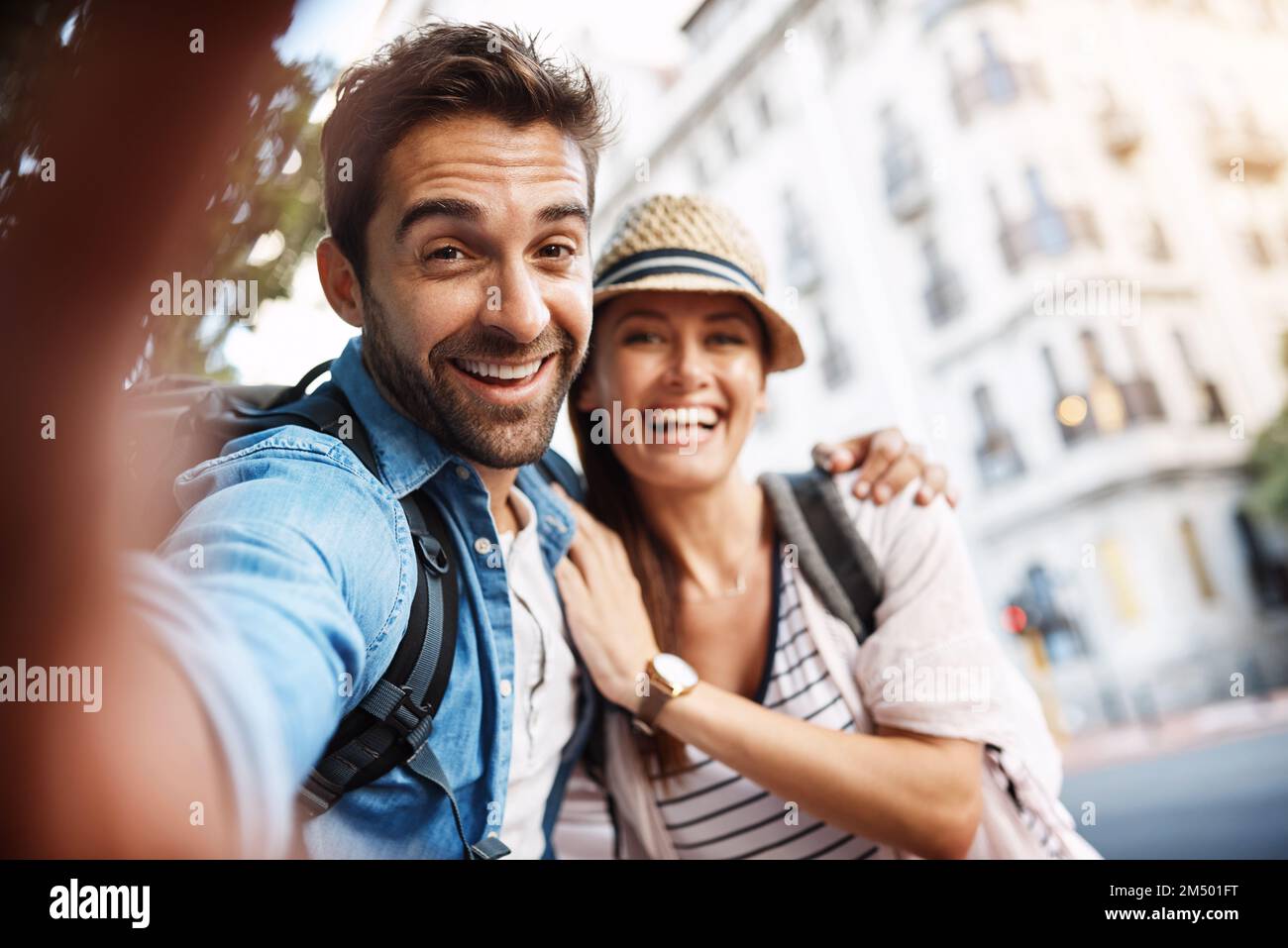 Selfies in a foreign city. Cropped portrait of an affectionate young ...
