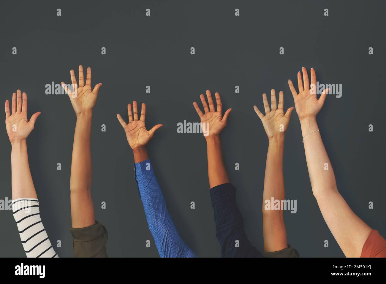 Raise your hand if youre part of our team. a group unrecognizable ...