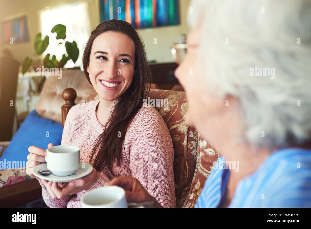 Theres nothing like enjoying a cup of tea with Granny. a senior woman ...