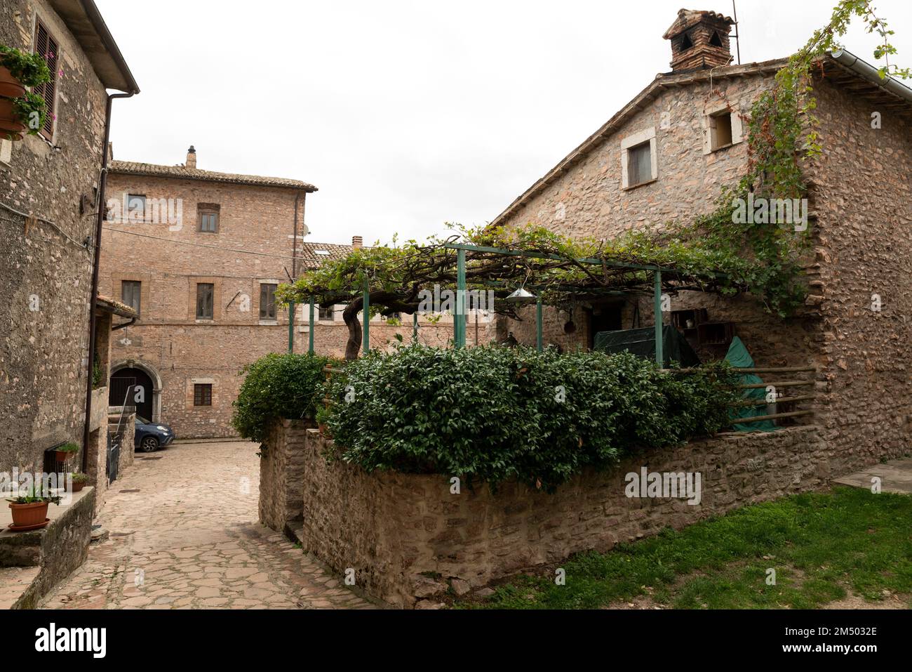 A beautiful shot of historic stone alleys with old buildings in ...