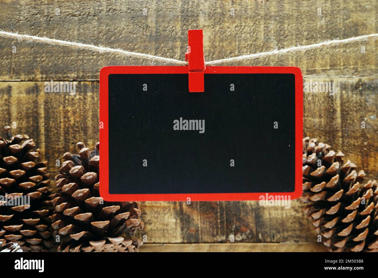 empty space copy paper hang with wooden clip and rope on wooden boards ...