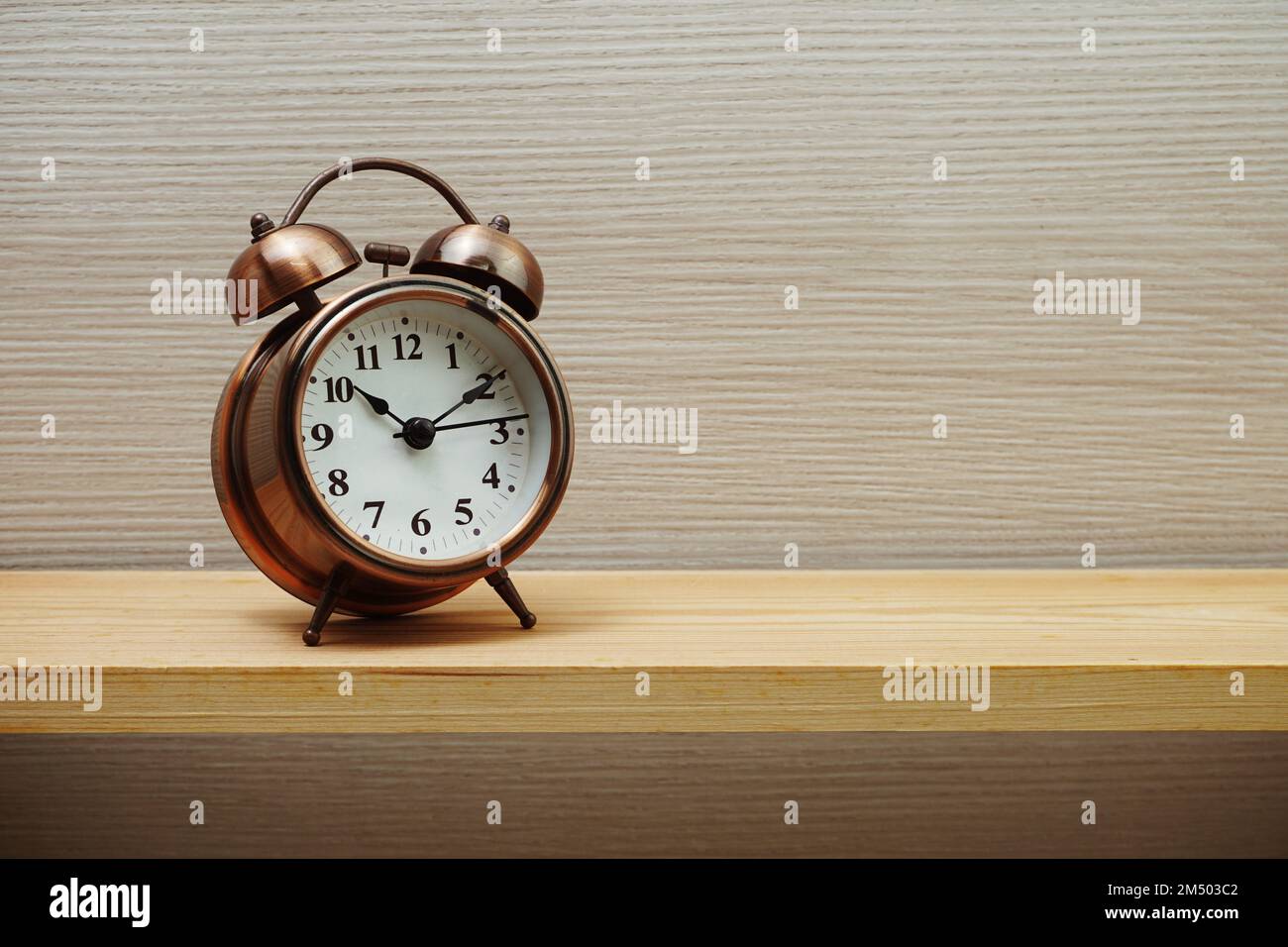 Vintage Alarm clock with space copy on wooden shelves Stock Photo - Alamy