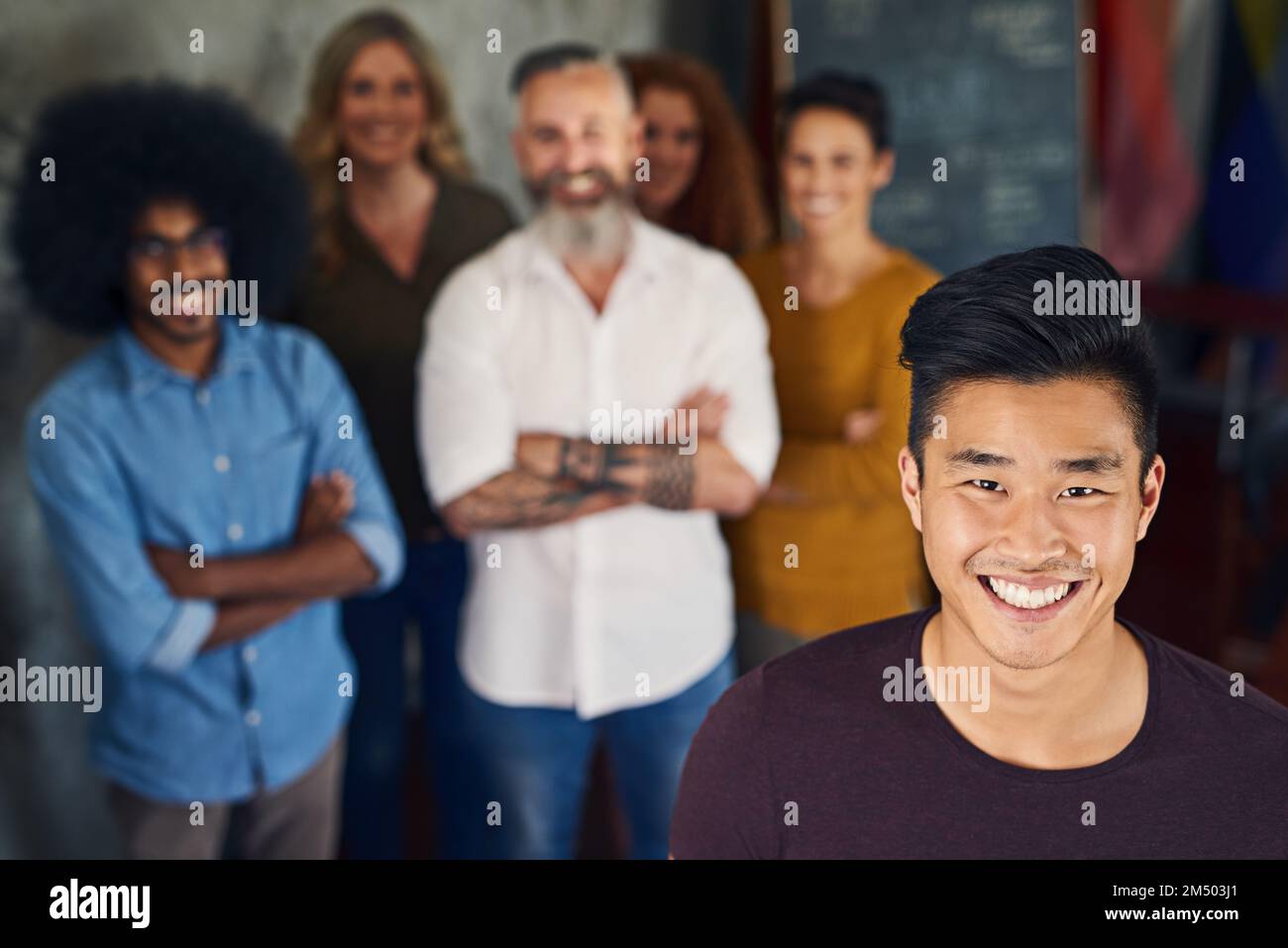 Happy diverse designers standing in hi-res stock photography and images ...
