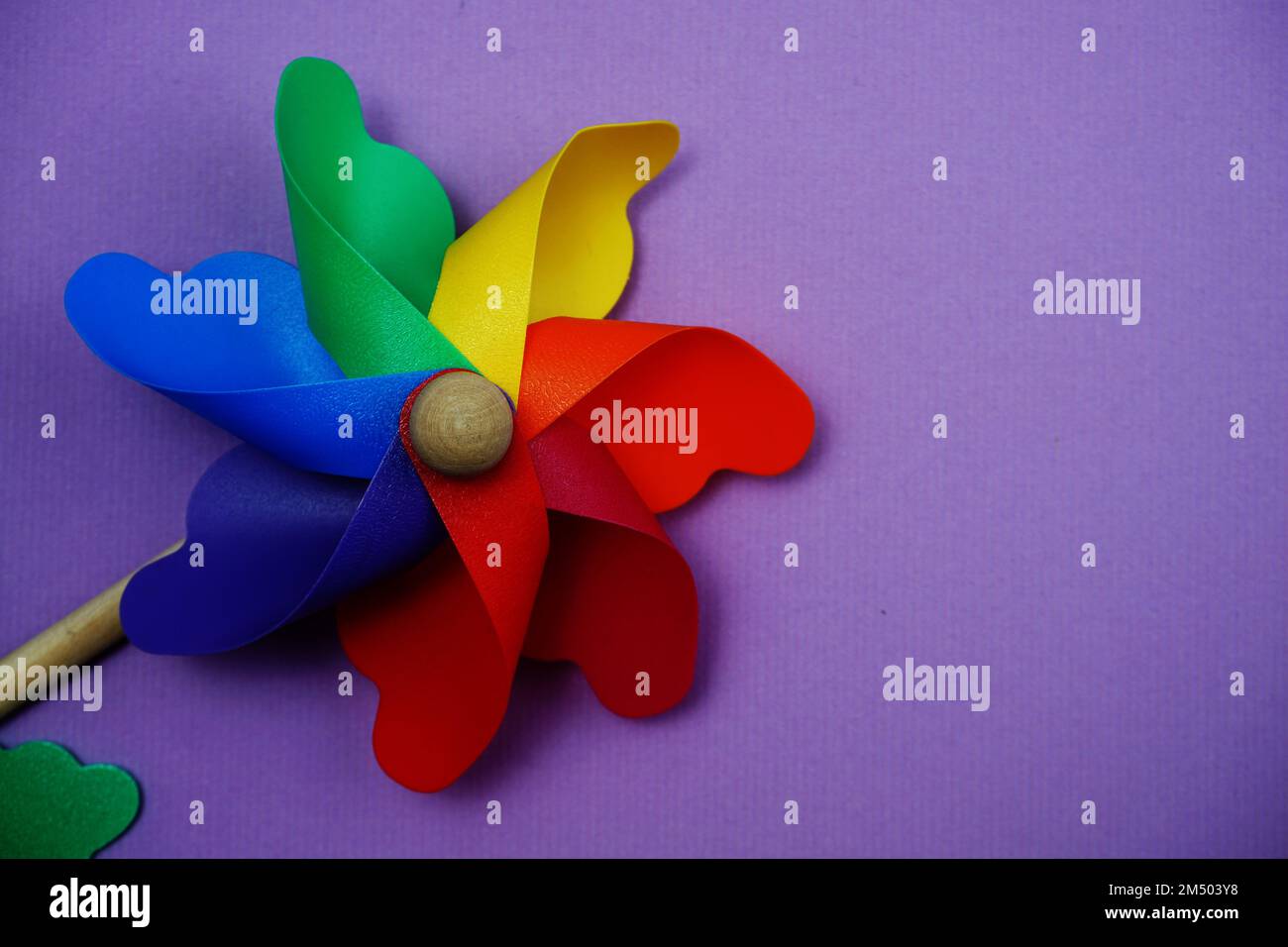 colorful pinwheel with space copy isolated on purple background Stock ...