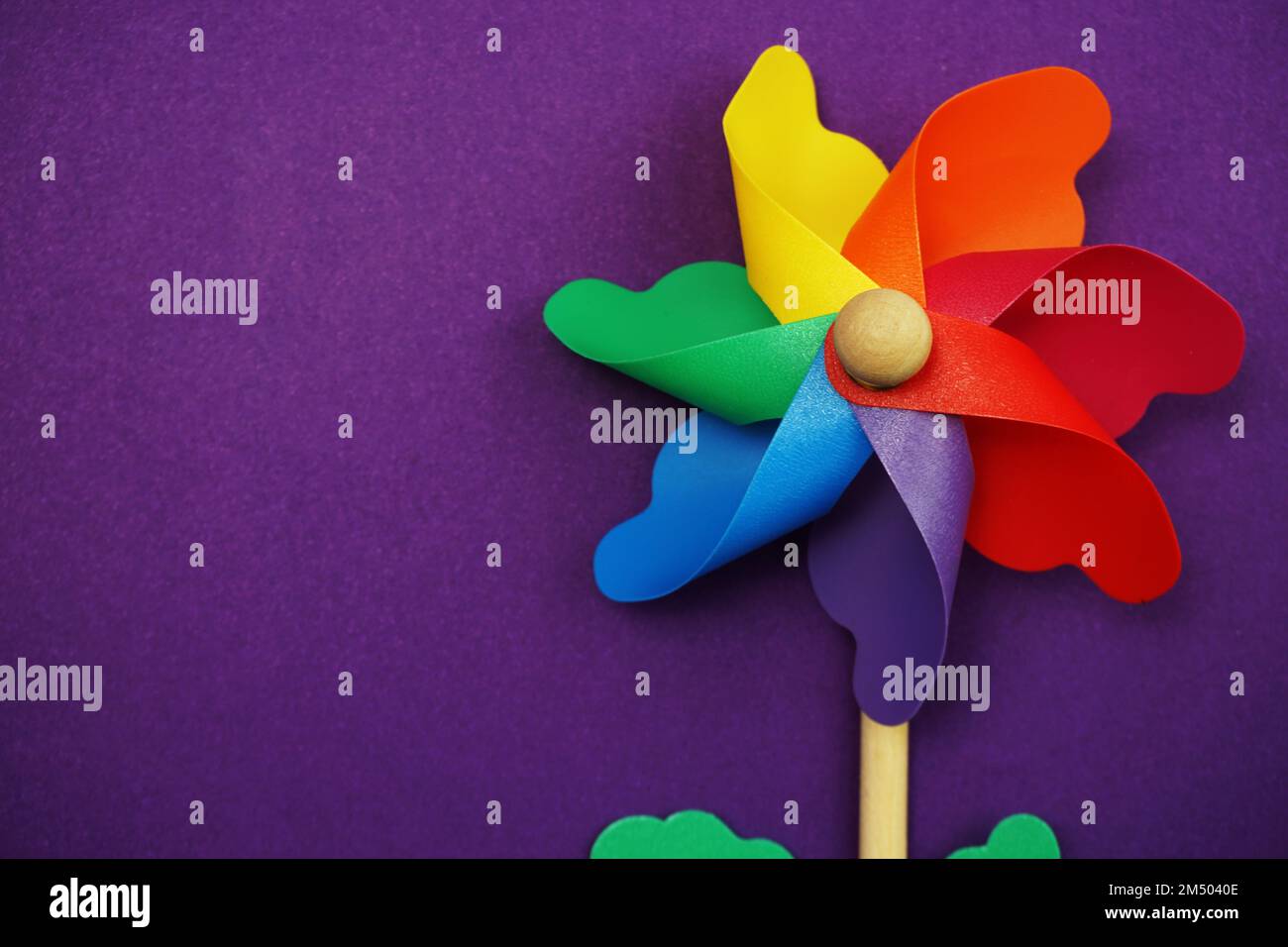 colorful pinwheel with space copy isolated on purple background Stock ...