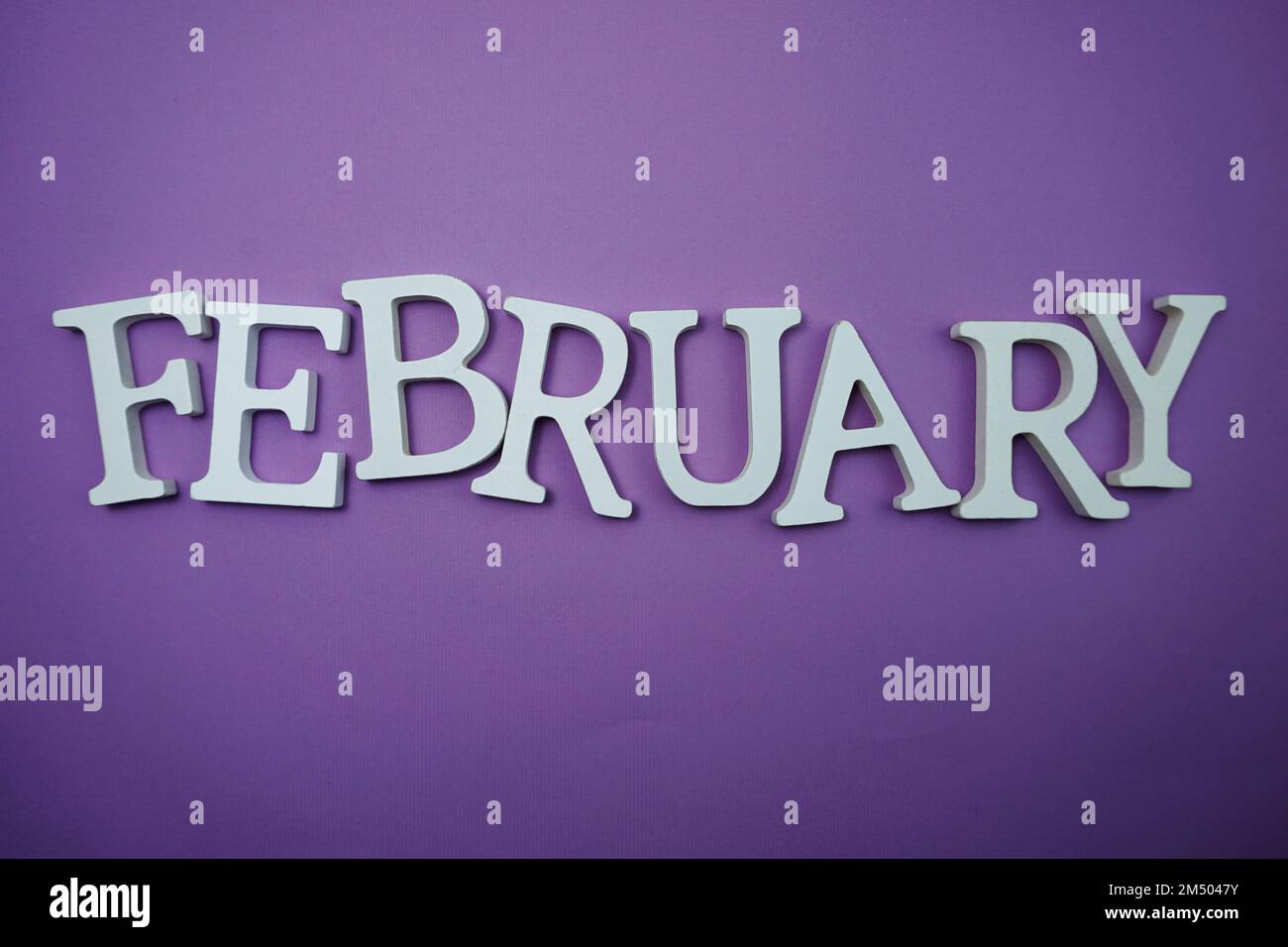 February alphabet letter with space copy on purple background Stock ...