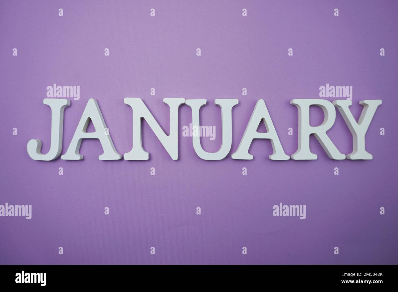 January alphabet letter with space copy on Purple background Stock ...