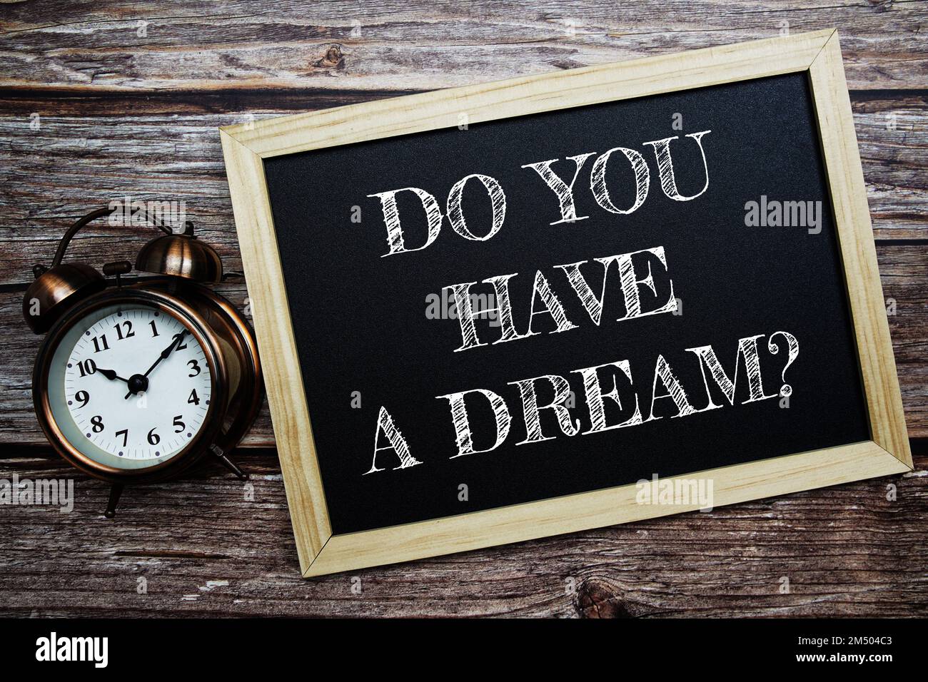 Do You Have A Dream? word with alarm clock on wooden background Stock ...