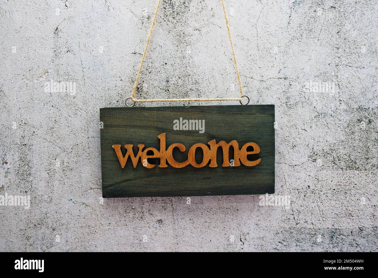 Wooden Welcome sign with space copy on concrete background Stock Photo ...