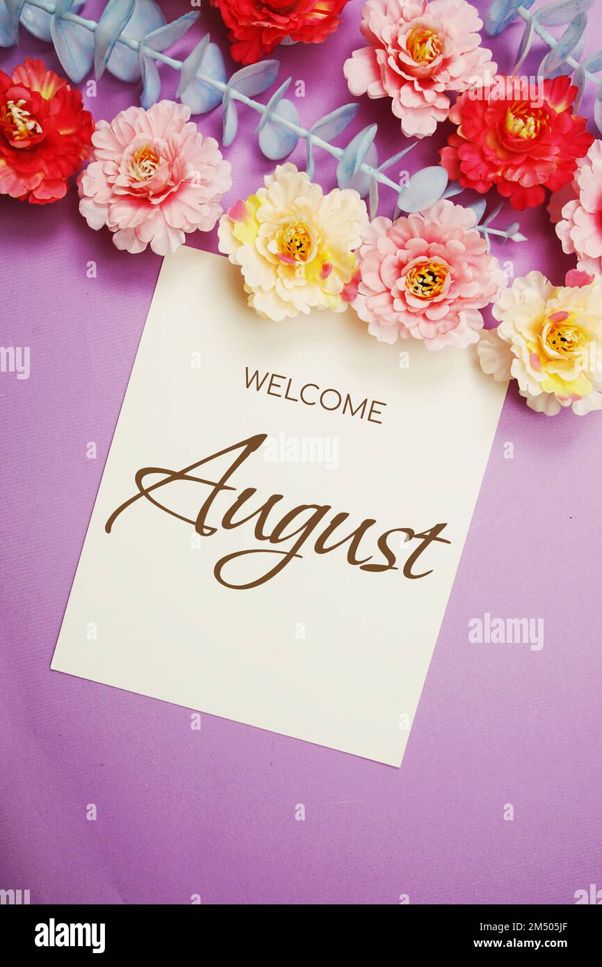 Welcome August typography text and flower decorate on purple background ...