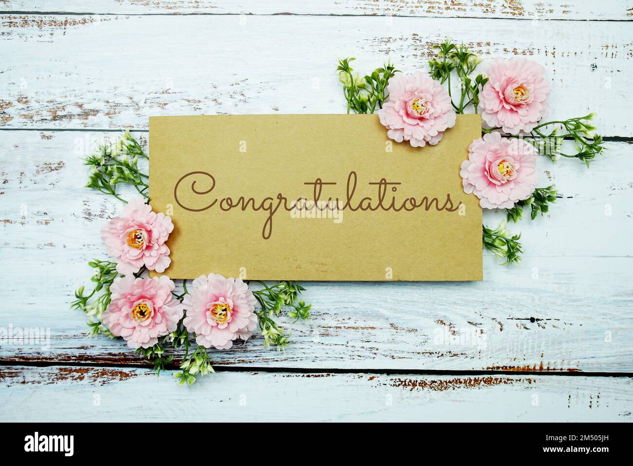 Congratulations typography text decorate with flower on wooden ...
