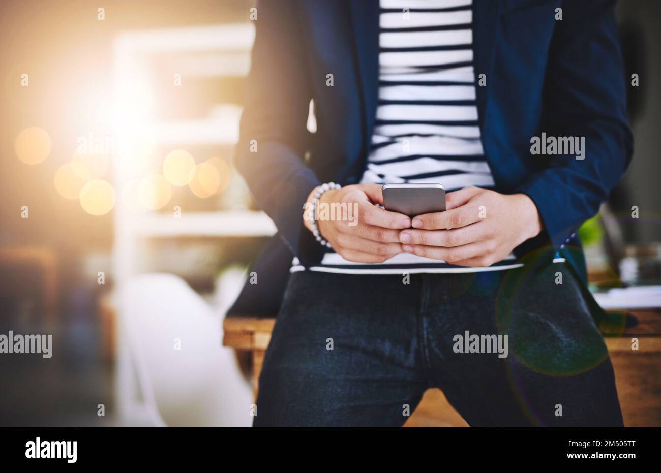 One phone, so many functions to suit business. a businessman using a ...