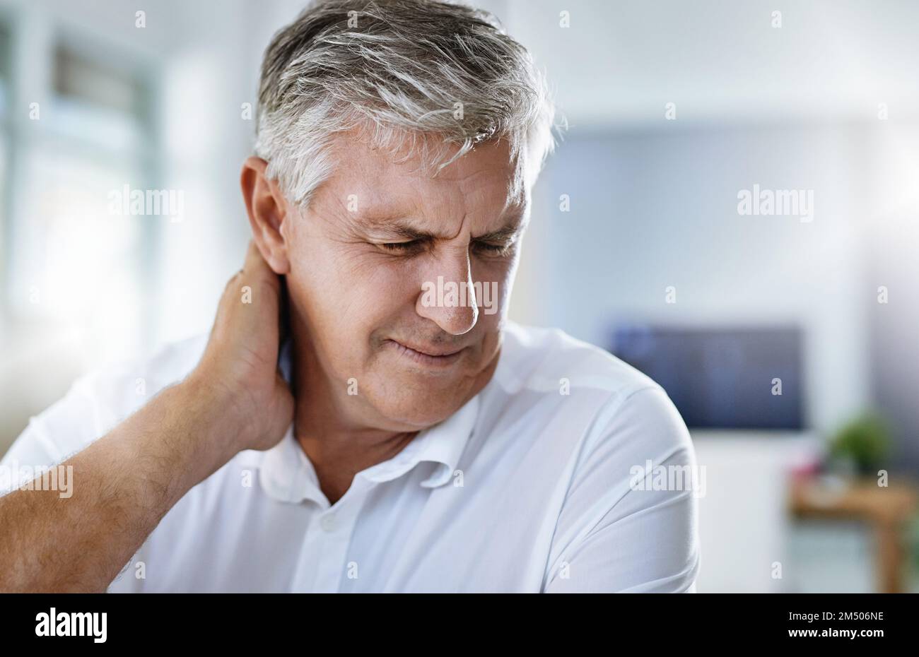 Mature man experiencing discomfort hi-res stock photography and images ...