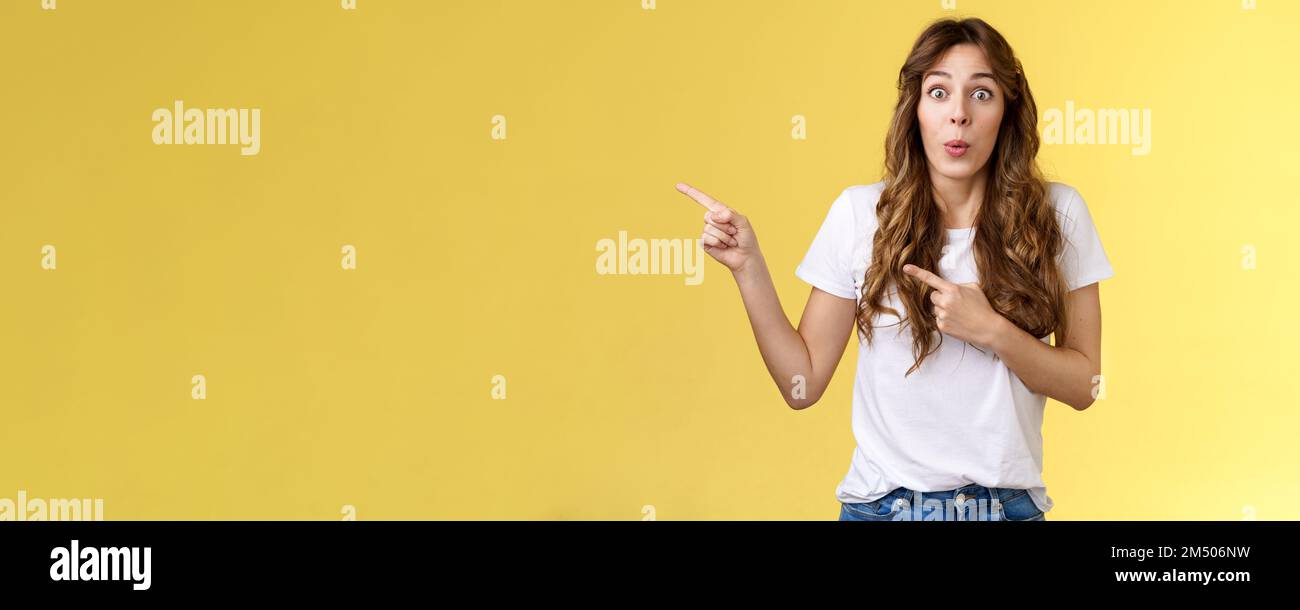 Awesome lets go look closer. Impressed surprised attractive caucasian ...