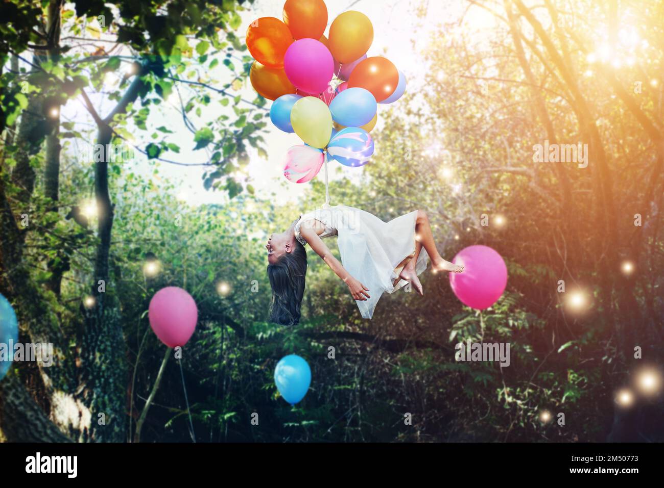 Set your imagination free. a little girl floating in the air with ...