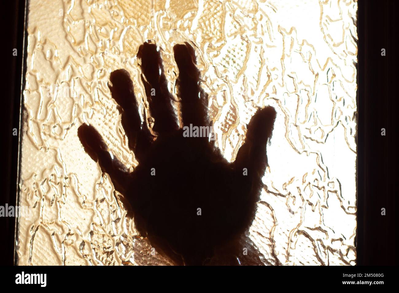 Child window hand on glass hi-res stock photography and images - Alamy