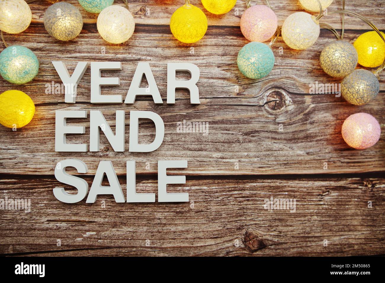 Year End Sale alphabet letters decorate with LED cotton balls on wooden ...