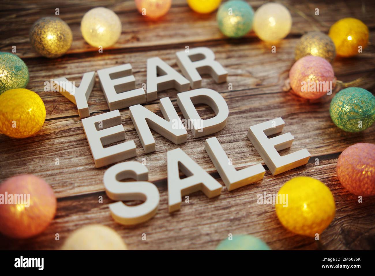 Year End Sale alphabet letters decorate with LED cotton balls on wooden ...
