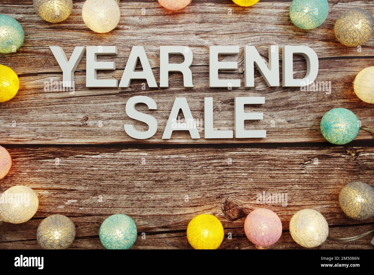 Year End Sale alphabet letters decorate with LED cotton balls on wooden ...