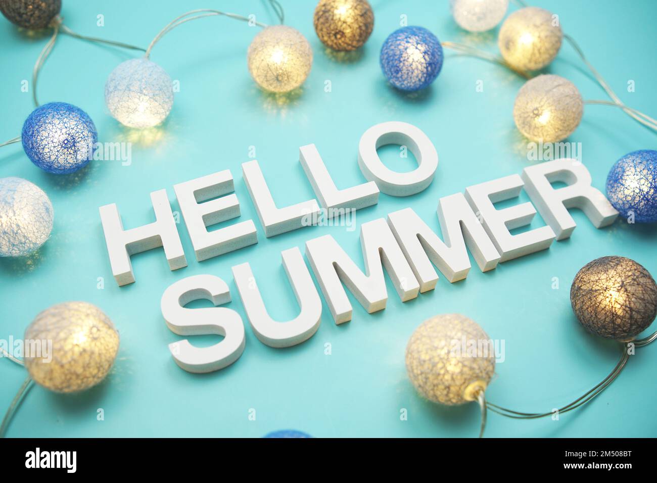 Hello Summer alphabet letter decorate with LED cotton balls on blue ...