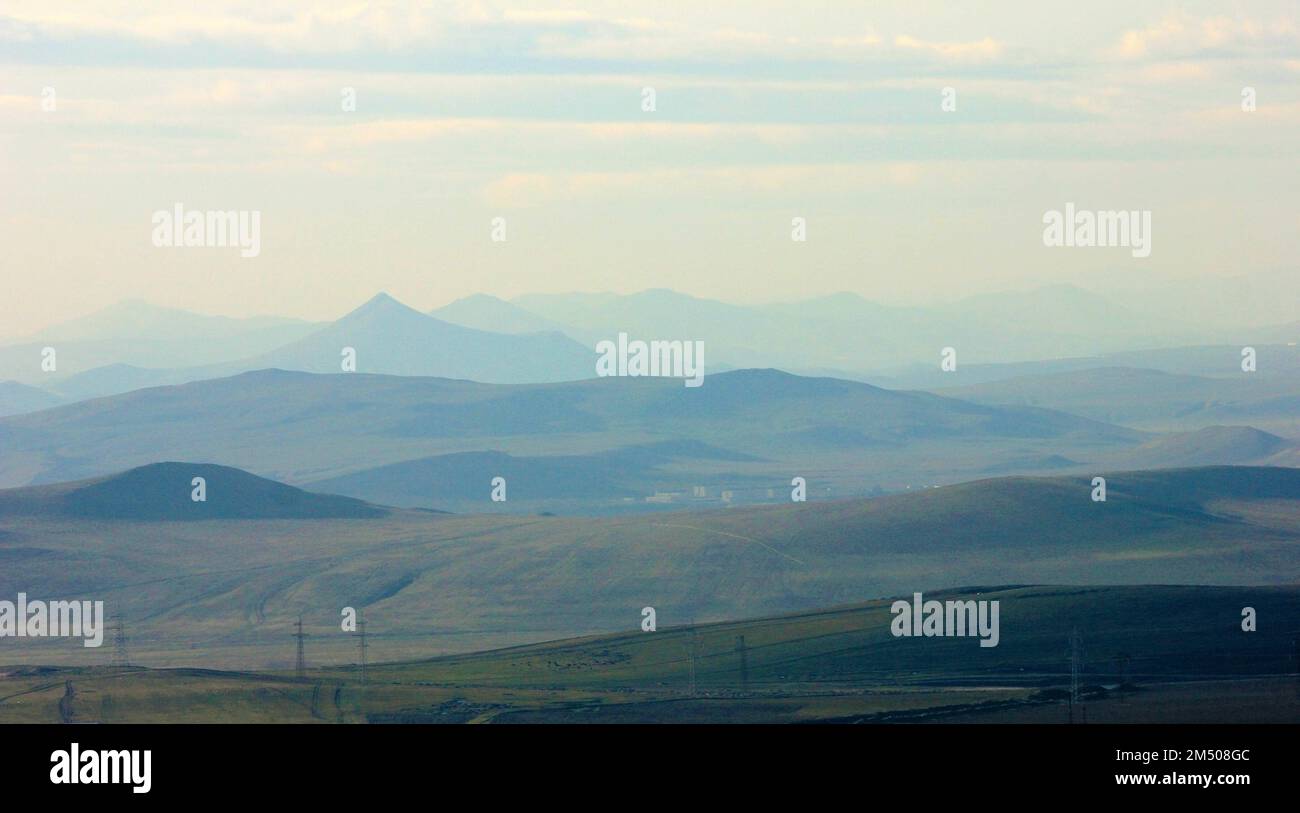 Beautiful mountain ranges standing behind each other Stock Photo - Alamy