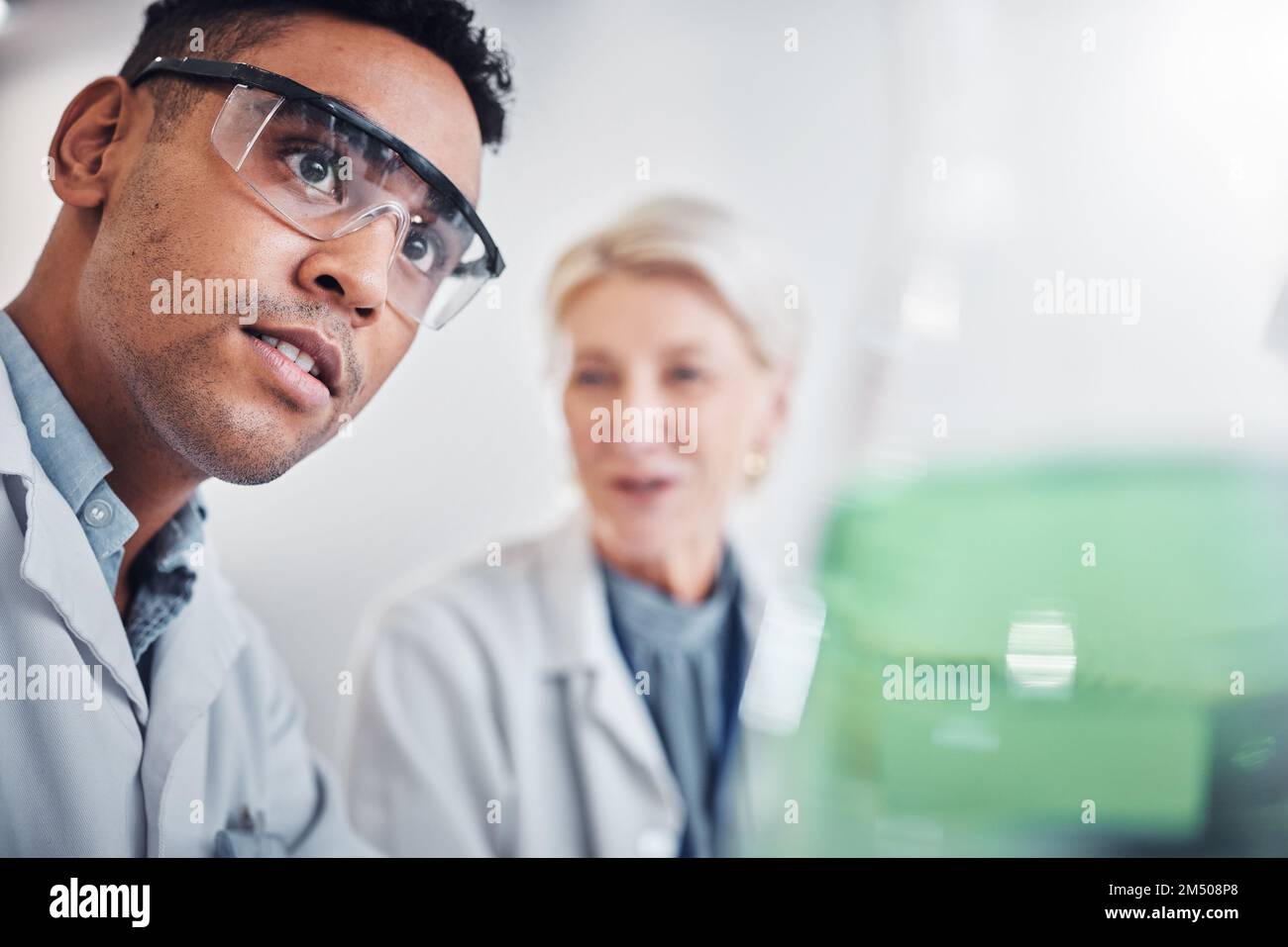 Face, doctors and beaker in laboratory for research, testing and ...