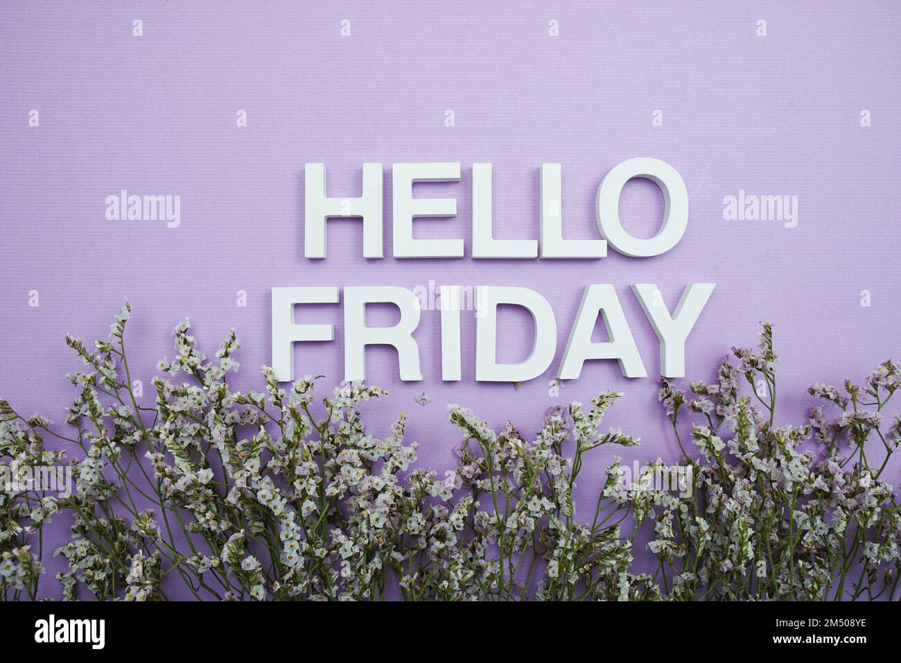 Hello Friday alphabet letters with flower frame on purple background ...