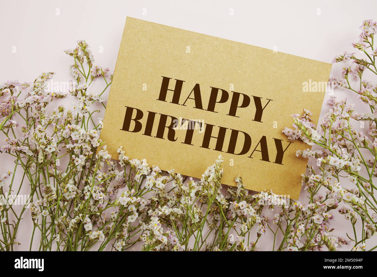 Happy Birthday text message with flower decoration blue background ...