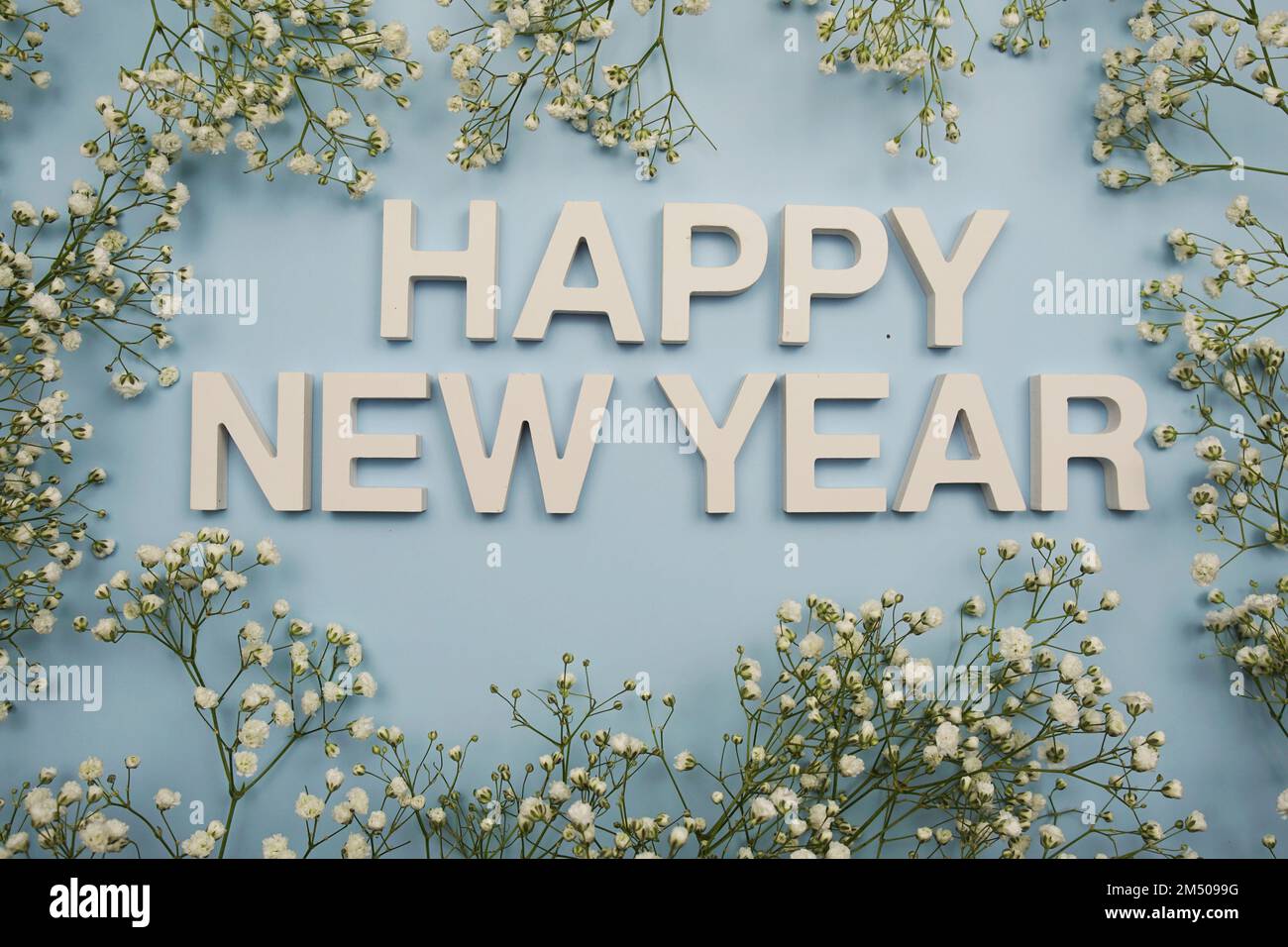 Happy New Year alphabet letters on wooden background Stock Photo - Alamy