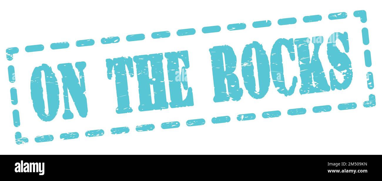 ON THE ROCKS text written on blue dash stamp sign Stock Photo - Alamy