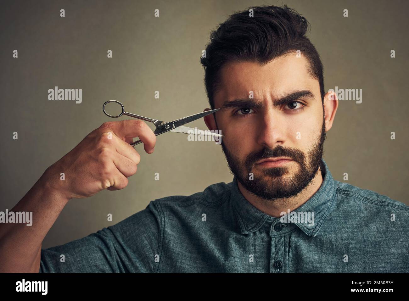 Hairy handsome young man standing hi-res stock photography and images ...