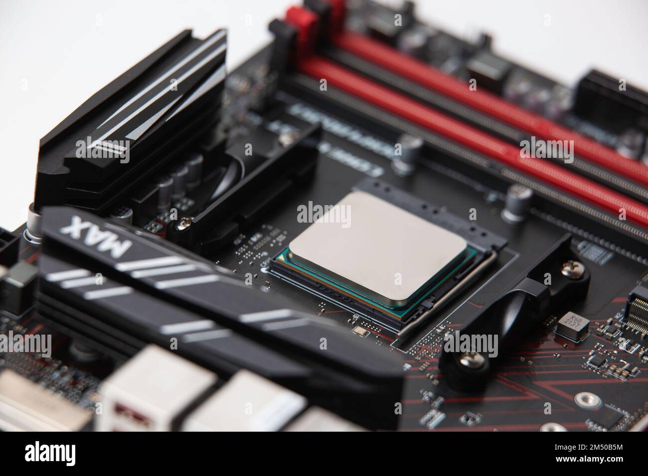 A Close up of MSI an computer motherboard isolated on a white ...