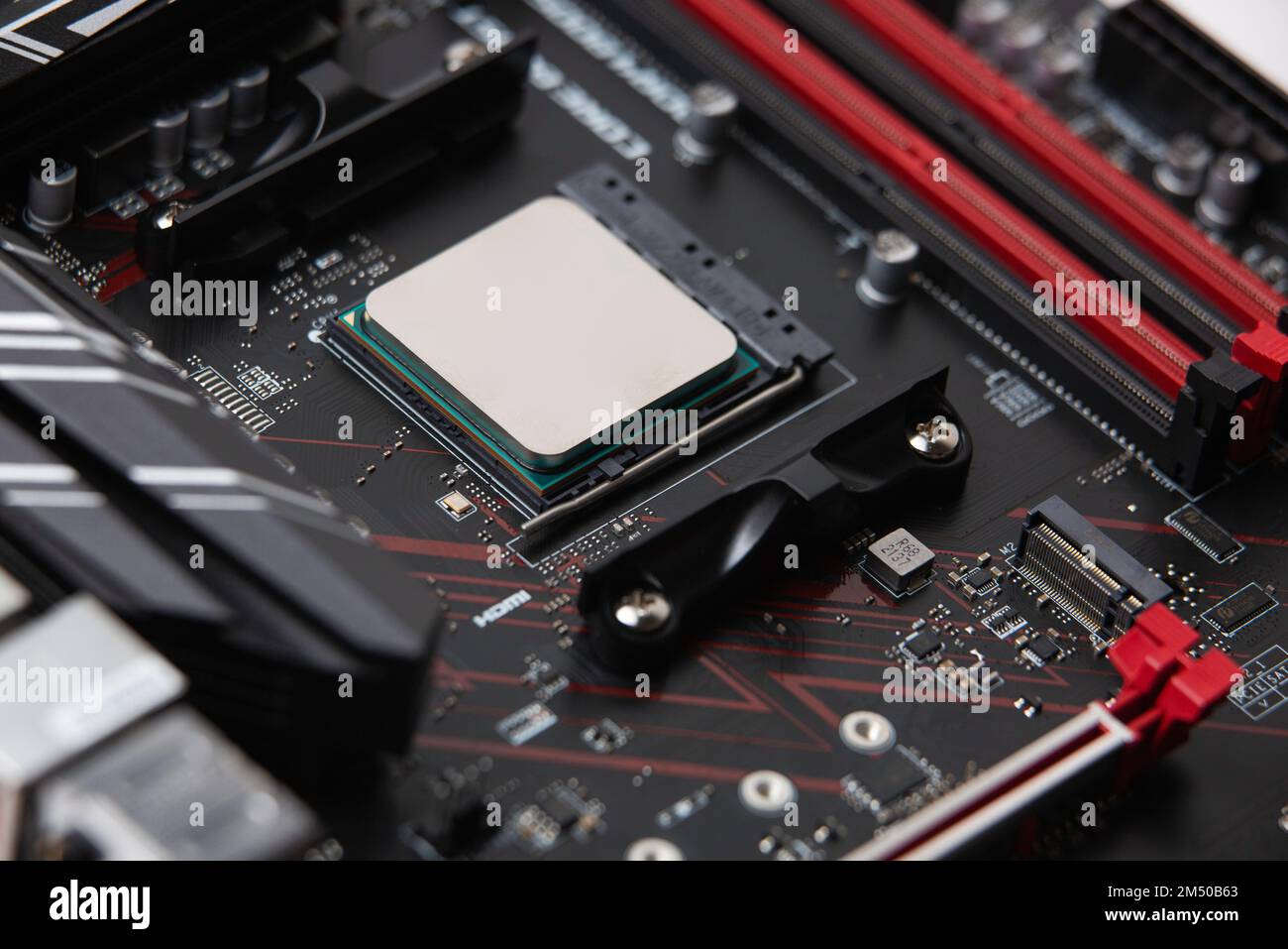 A Close up of MSI an computer motherboard isolated on a white ...