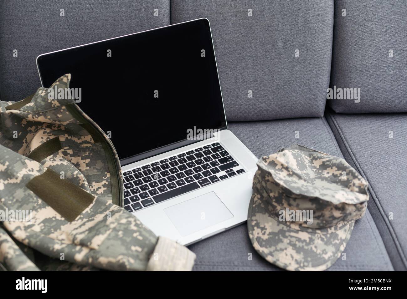 Camouflage soldier laptop hi-res stock photography and images - Alamy