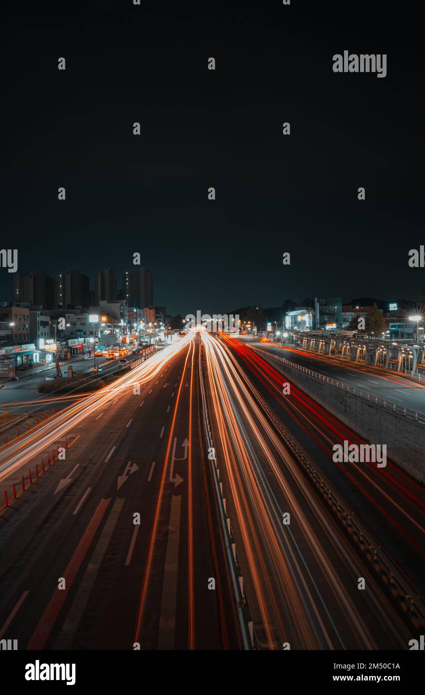 a time lapse photography effect over a view from top of the bridge ...