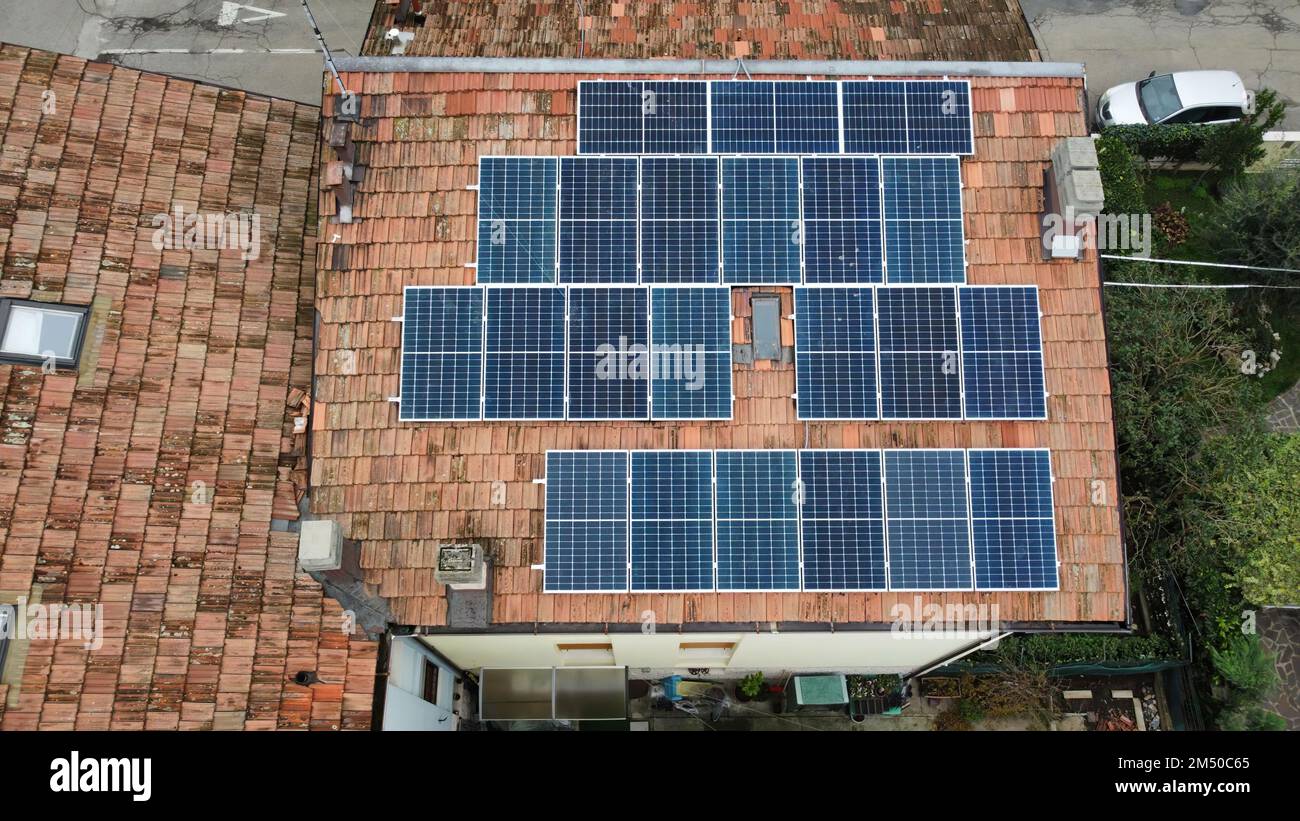 Aerial top down view of solar panels modules mounted on roof. Solar ...